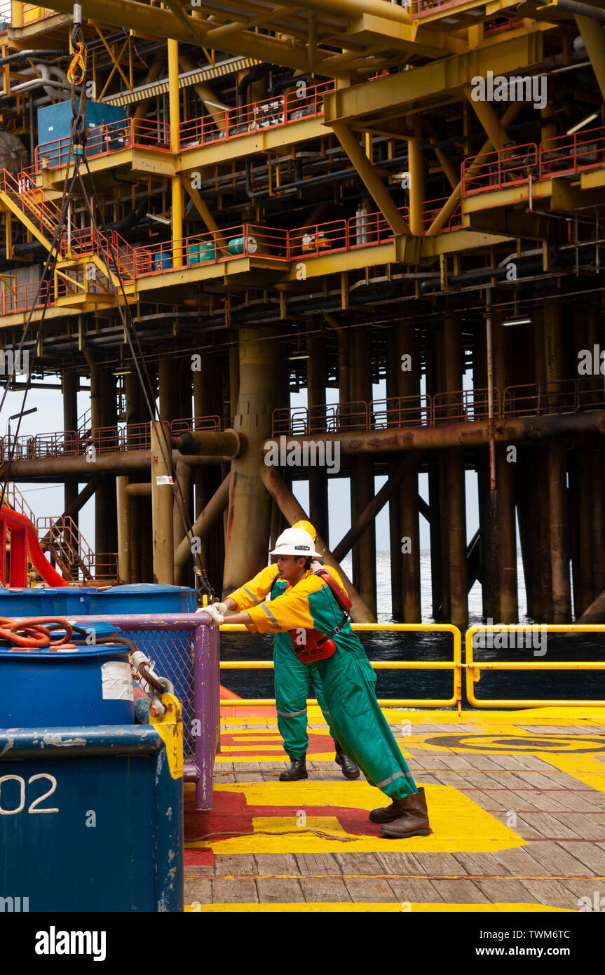 offshore worker working on deck for loading cargo Stock Photo - Alamy