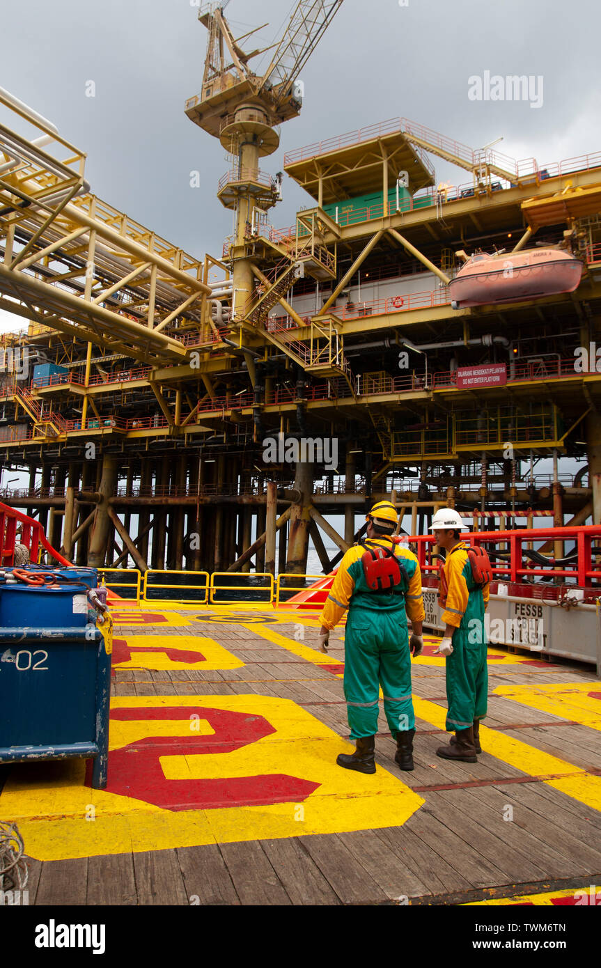 offshore worker working on deck for loading cargo Stock Photo - Alamy