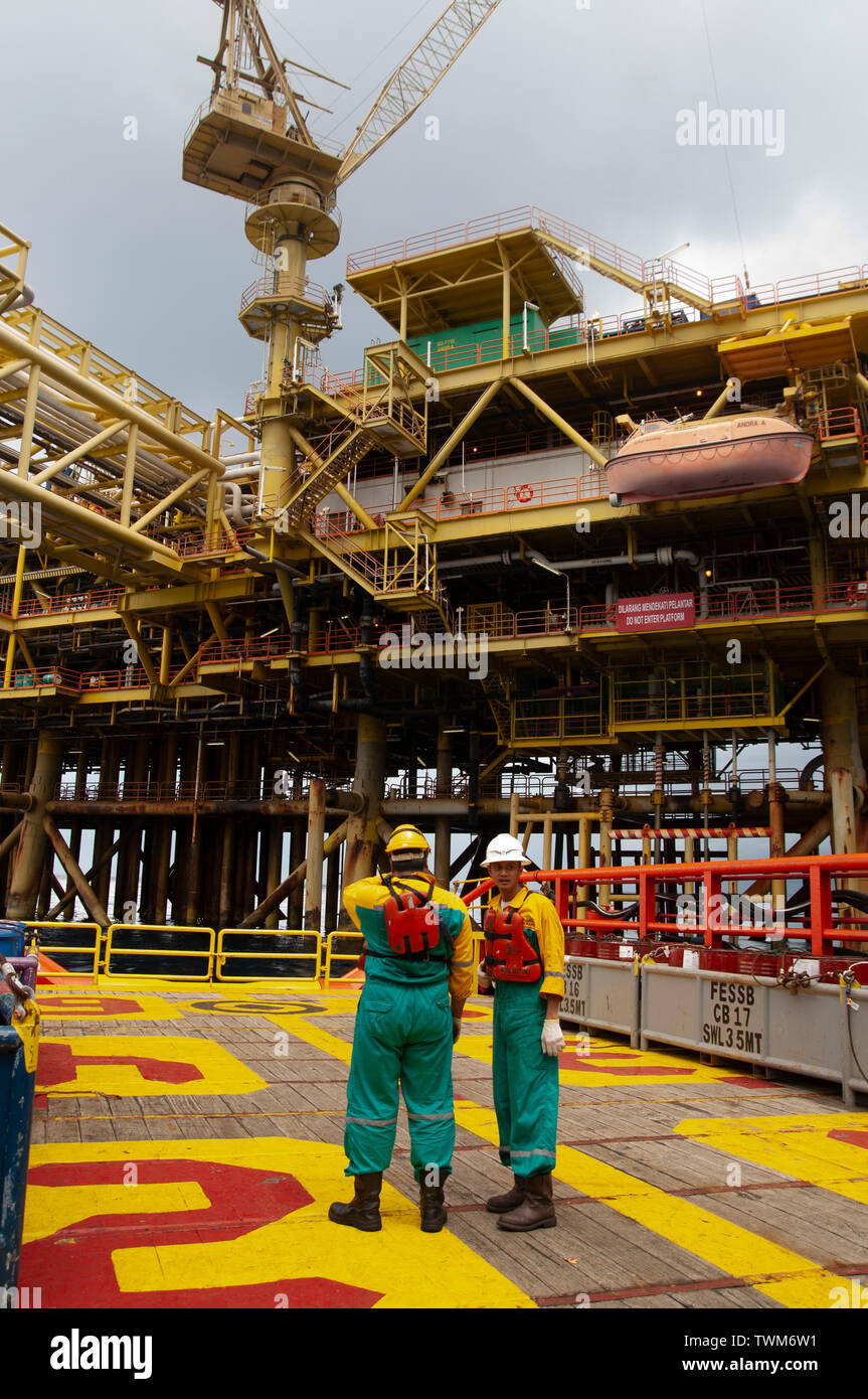 offshore worker working on deck for loading cargo Stock Photo - Alamy