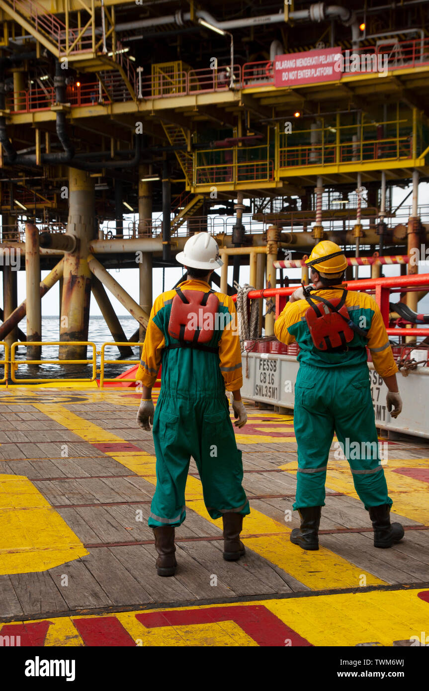 offshore worker working on deck for loading cargo Stock Photo - Alamy