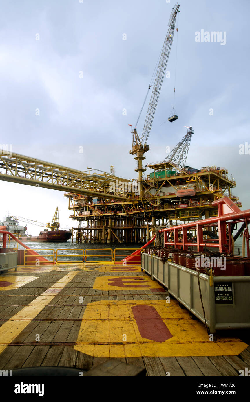 offshore worker working on deck for loading cargo Stock Photo - Alamy