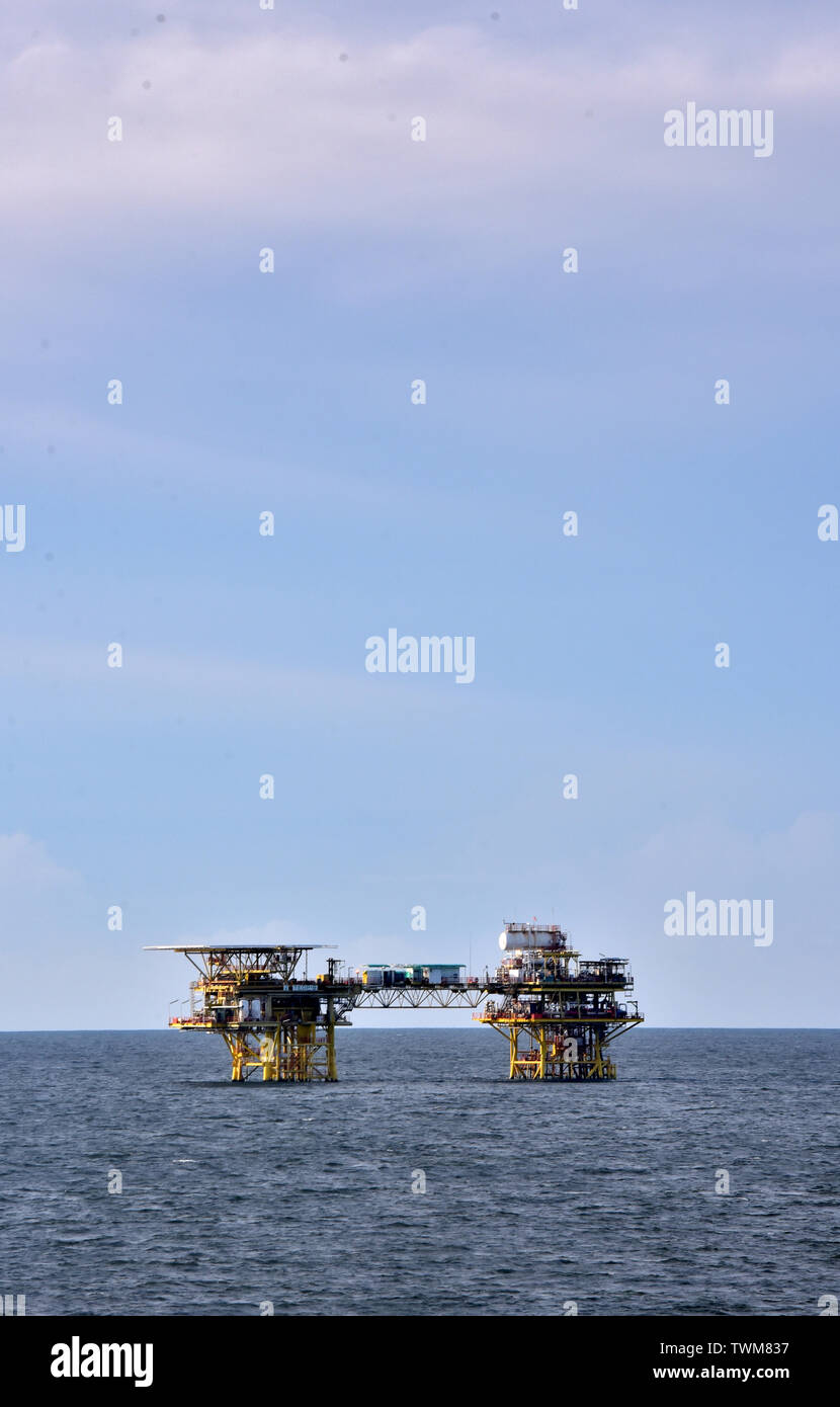 oil platform at middle ocean with beautiful sky Stock Photo - Alamy