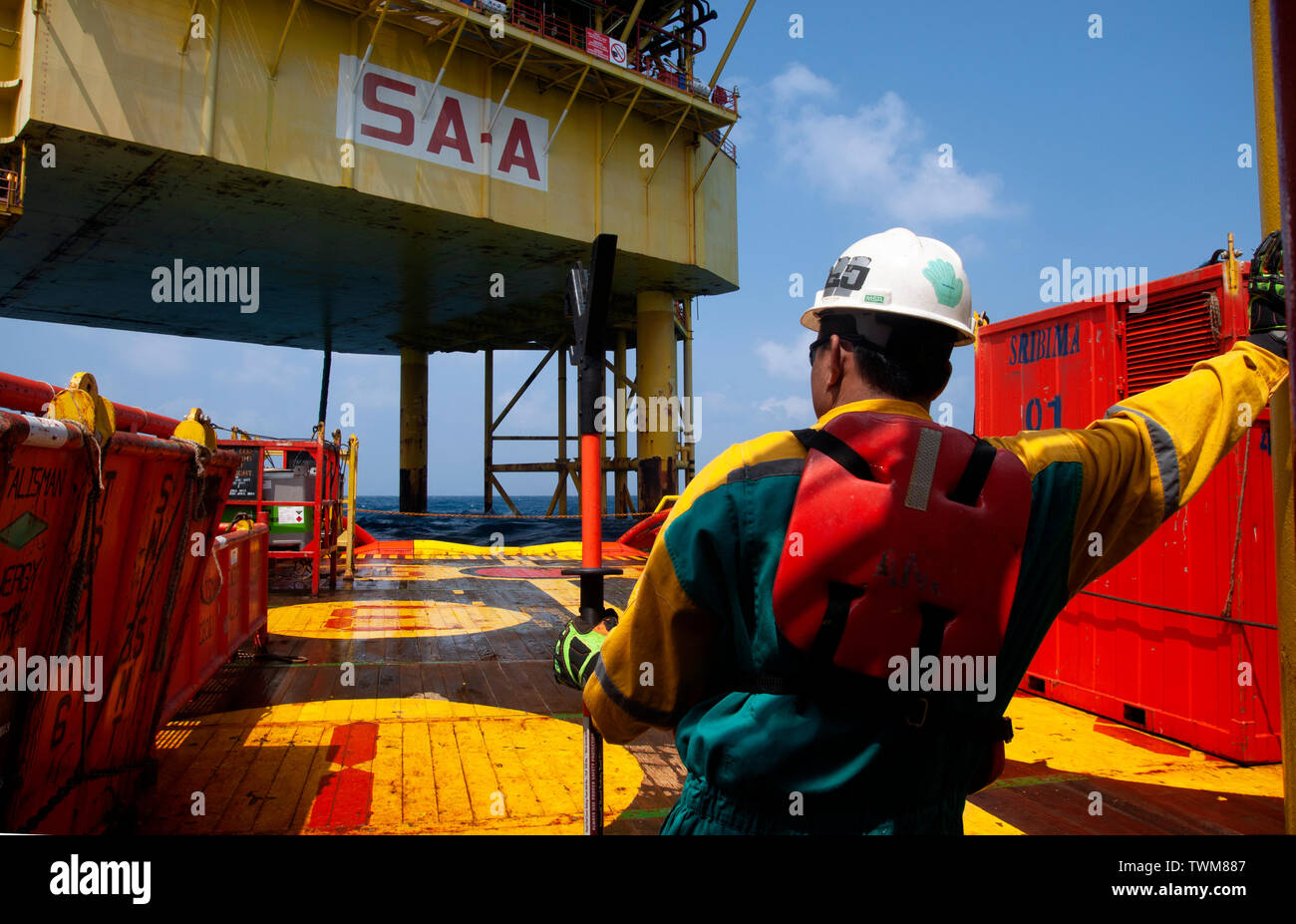 marine crew handling and arrange cargo on deck by using special tool ...