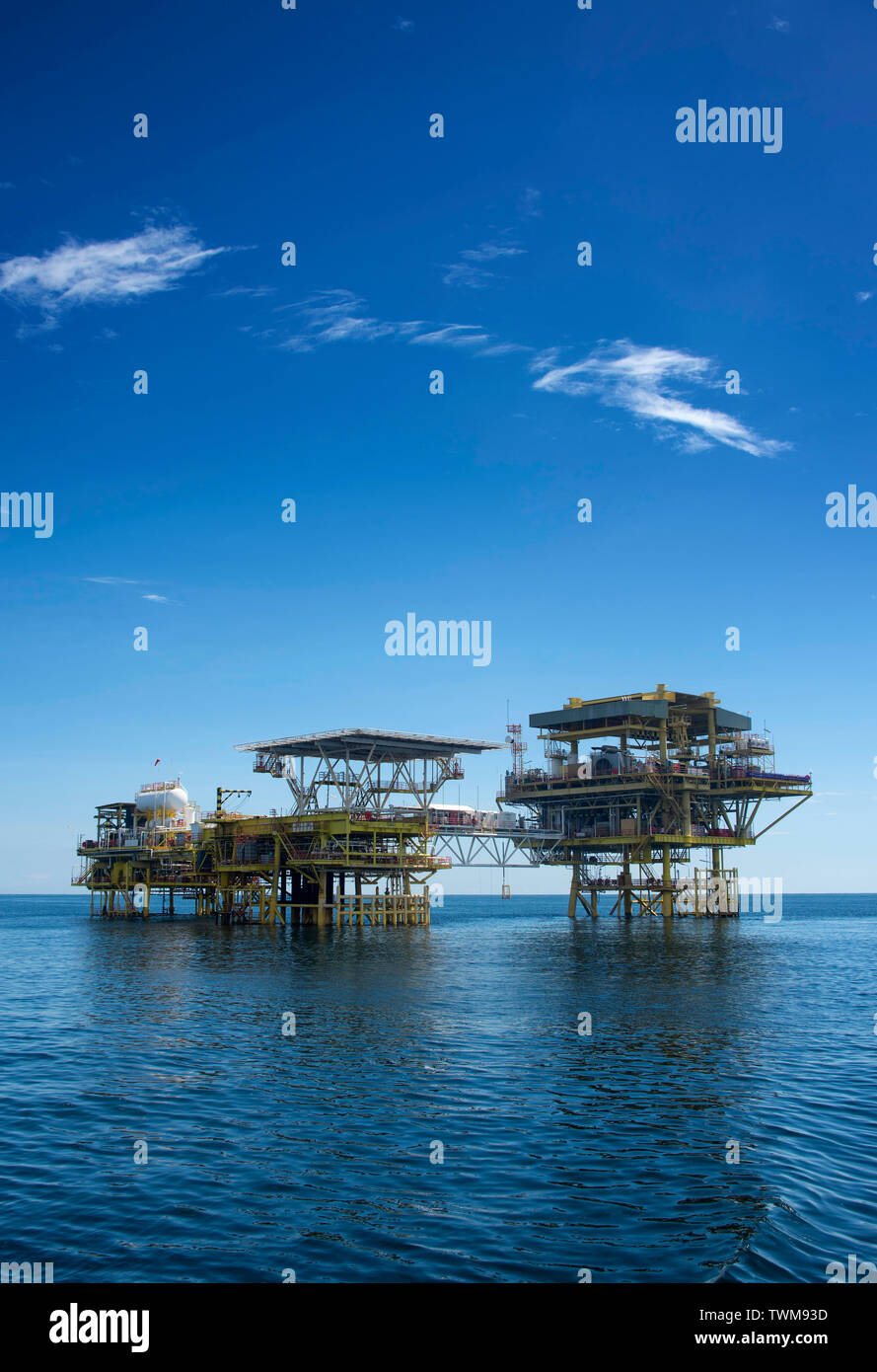 oil platform at sea during afternoon with blue sky Stock Photo - Alamy