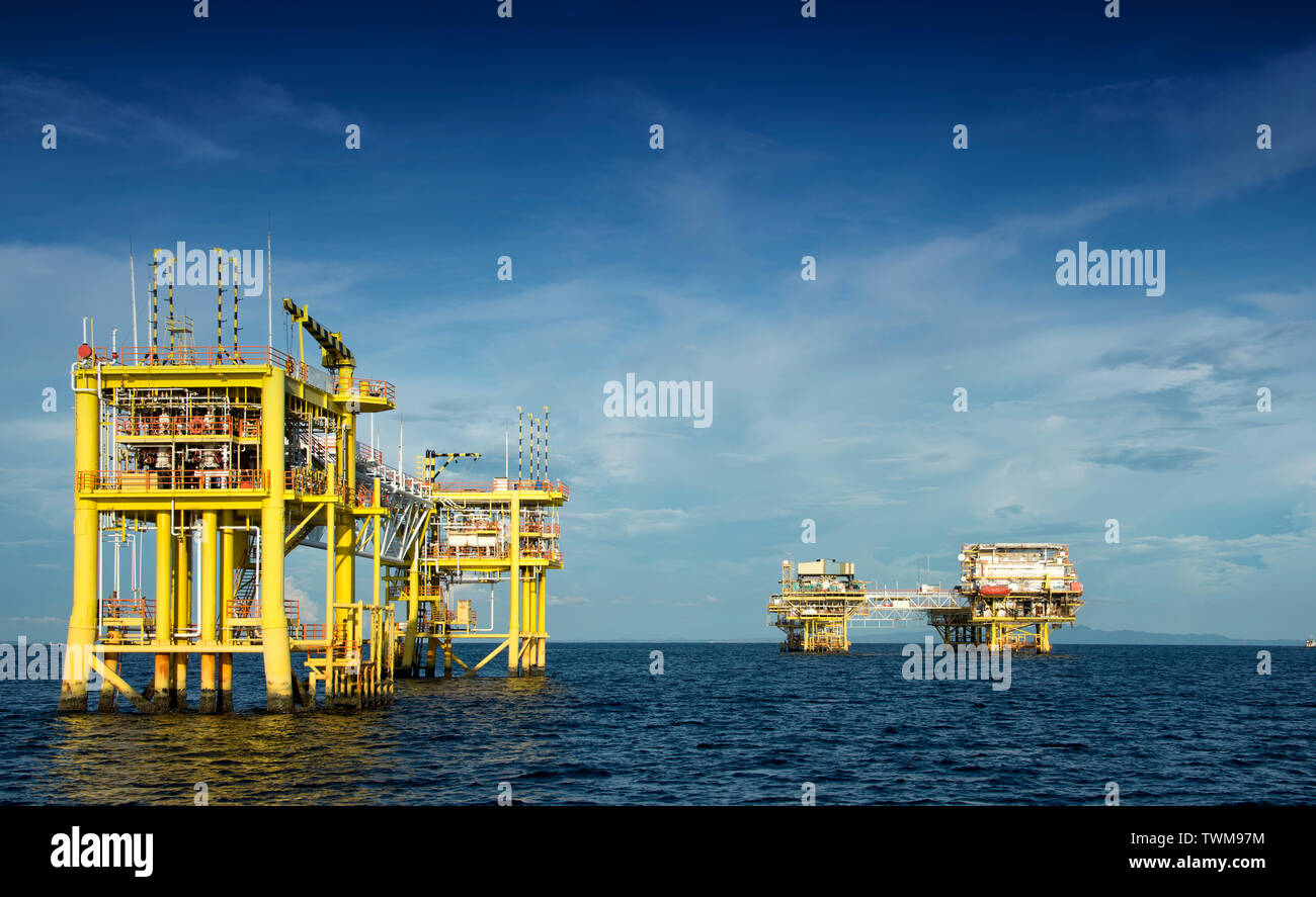 oil platform at sea during afternoon with blue sky Stock Photo - Alamy