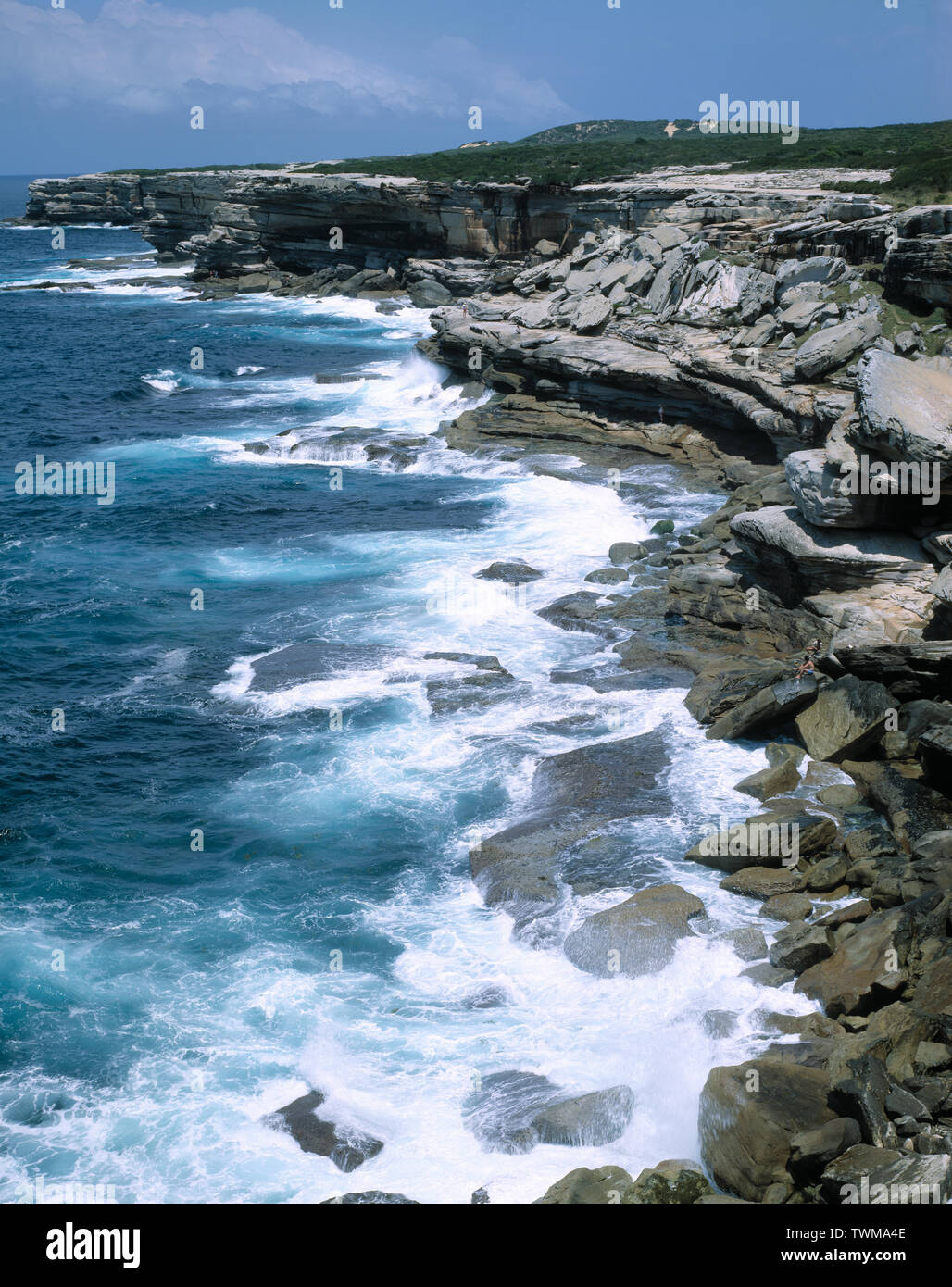 Australia. Sydney. Coast view. Cliffs at Kurnell Peninsula with men ...