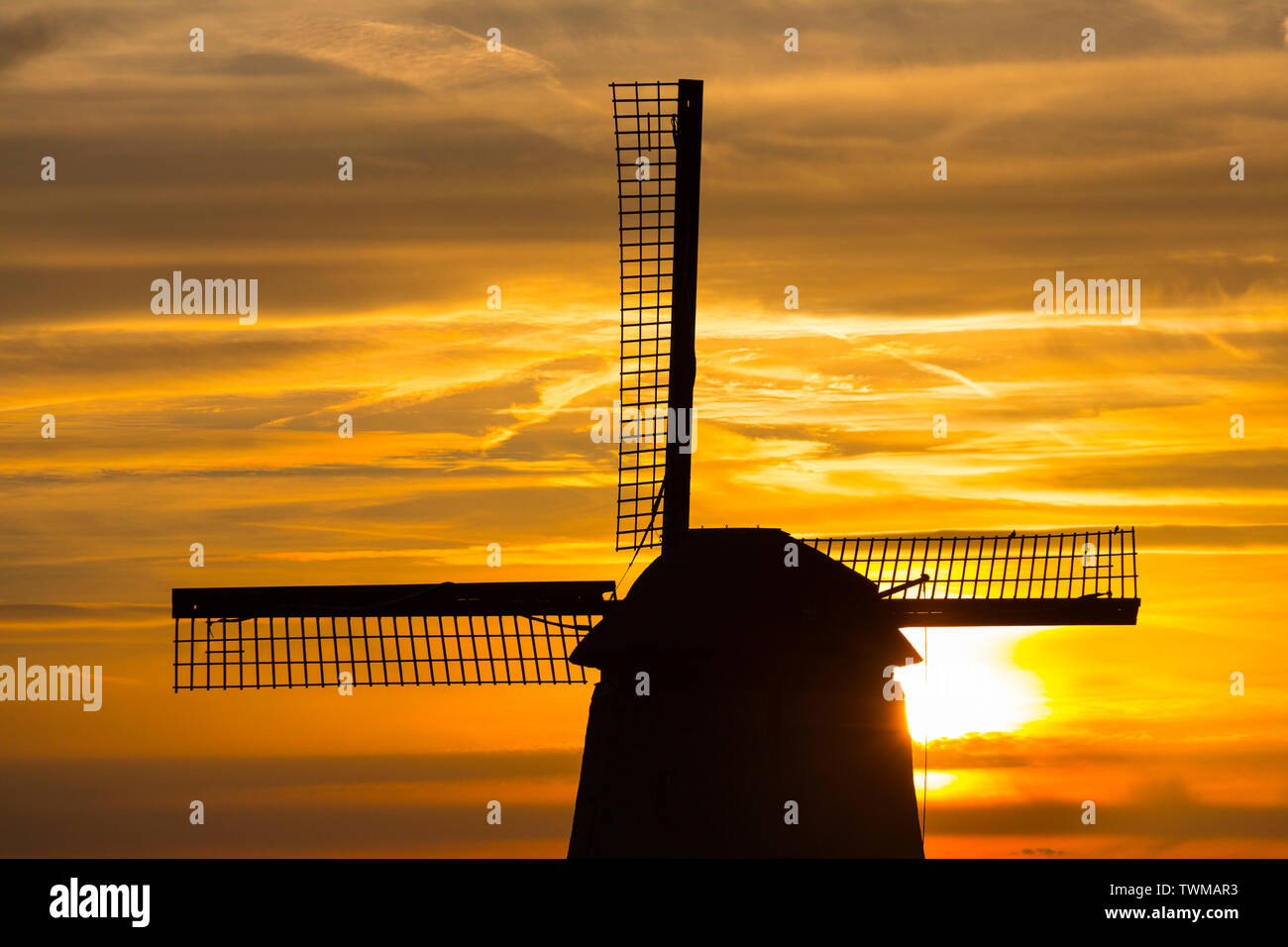 Windmills at Schermerhorn showing sea level, Stompetoren, Netherlands ...