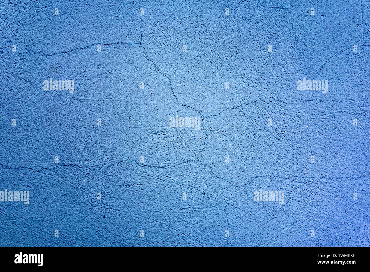 Blue cracked texture surface background. Copy space or backdrop for ...