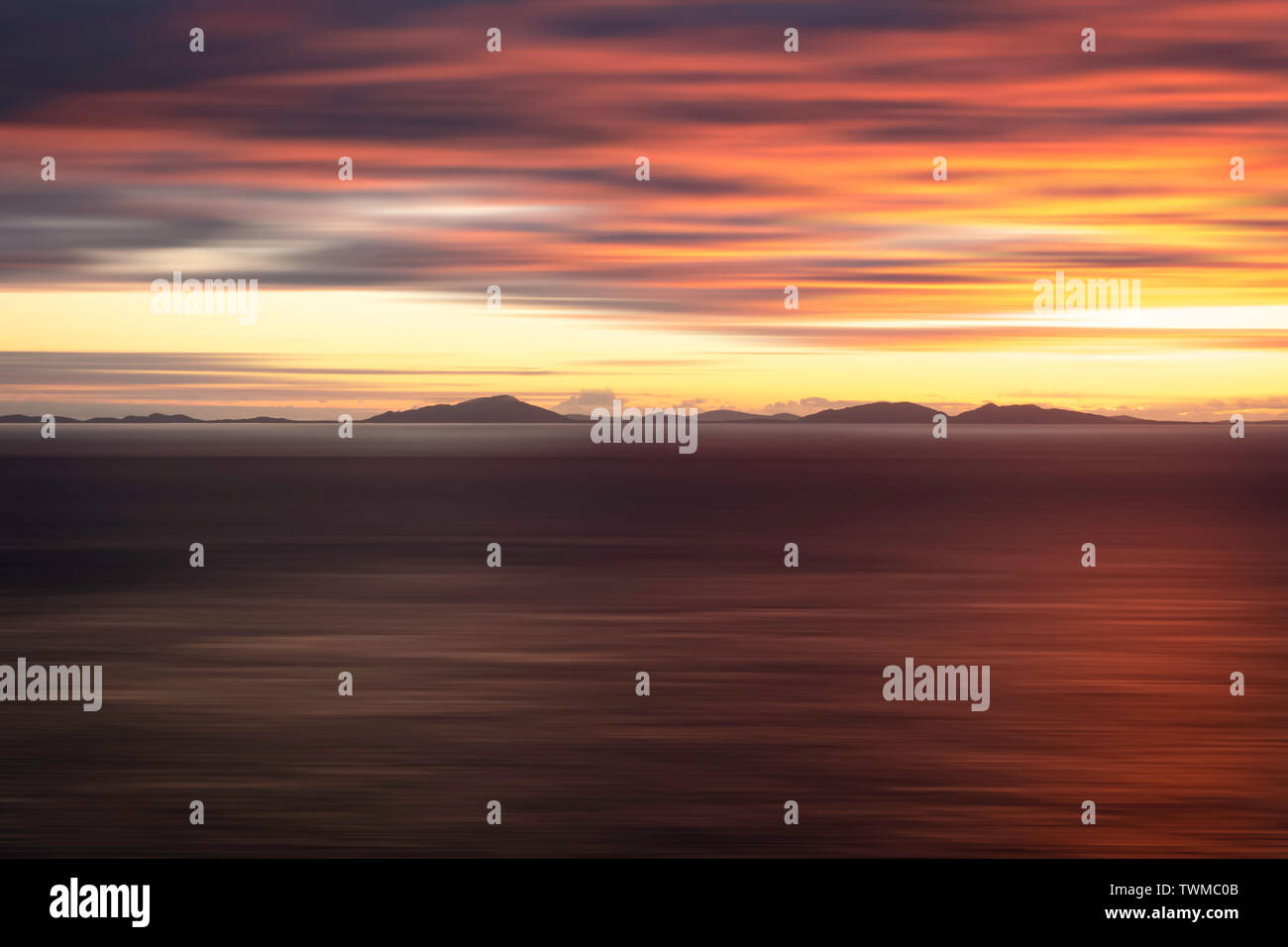 Sunset seascape scene on Isle of Skye,Scotland.Islands on sea during ...