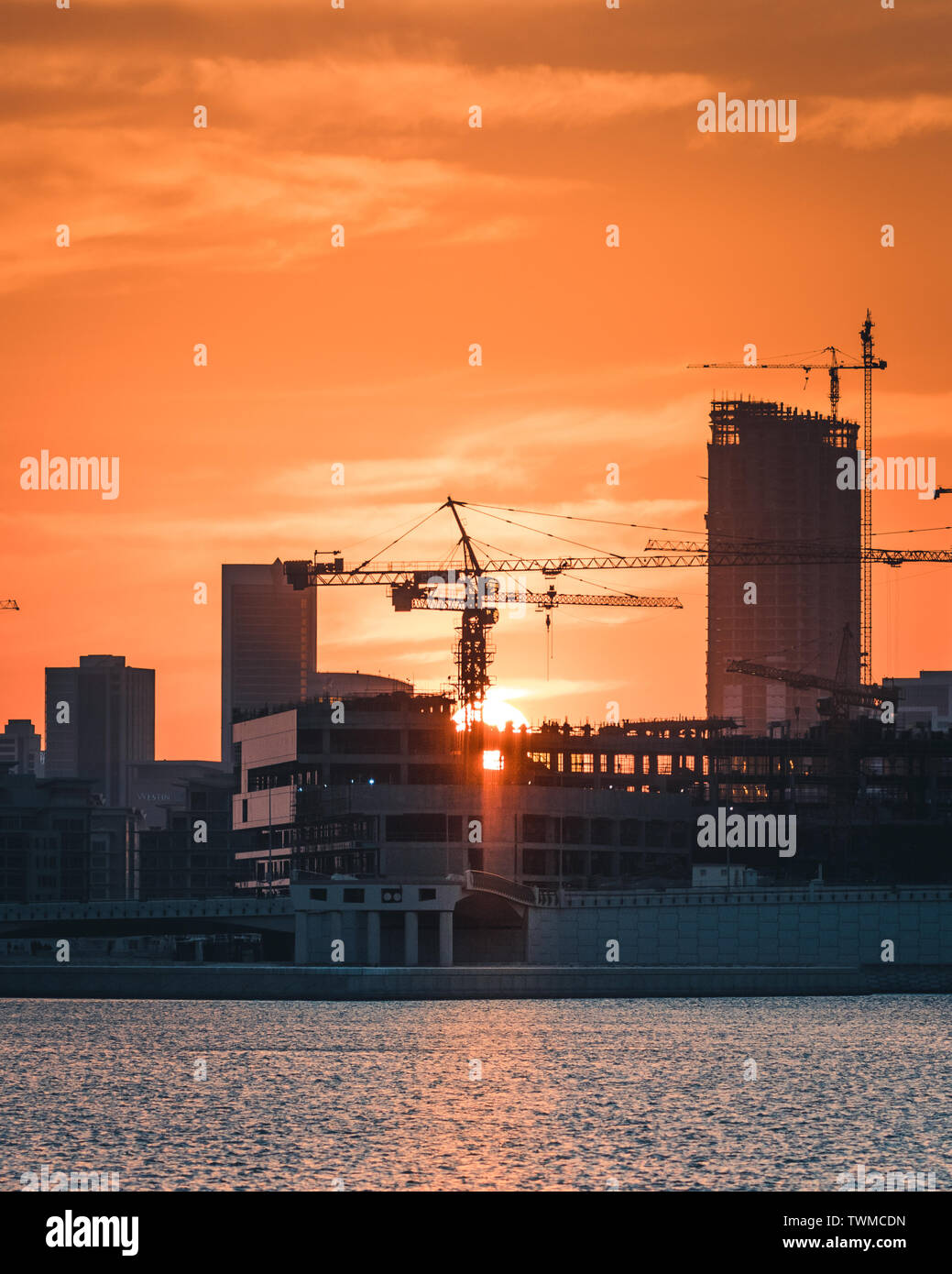 Manama/Bahrain- January 31 2018: The sun setting in Bahrain Bay. The ...