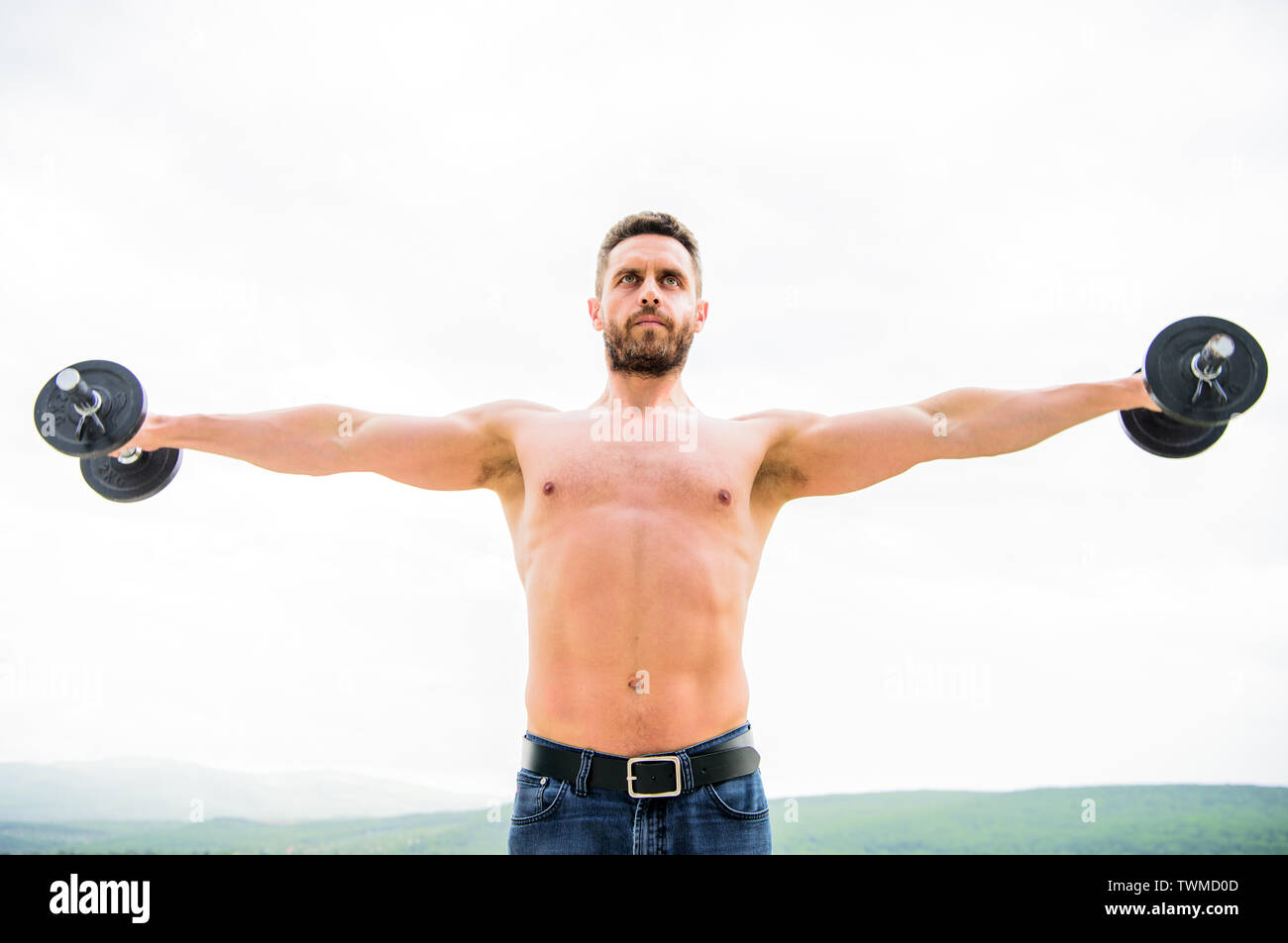 Hustle to gain more muscle. Healthy mind in healthy body. Muscular man ...