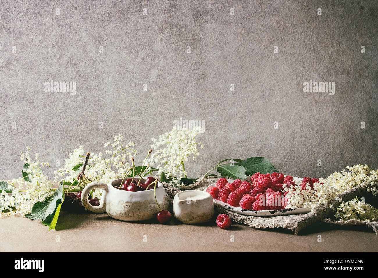 Fresh cherry and raspberry berries Stock Photo - Alamy