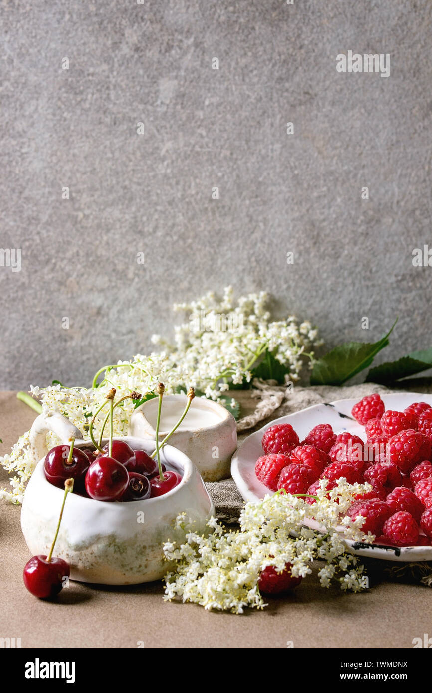 Fresh cherry and raspberry berries Stock Photo - Alamy