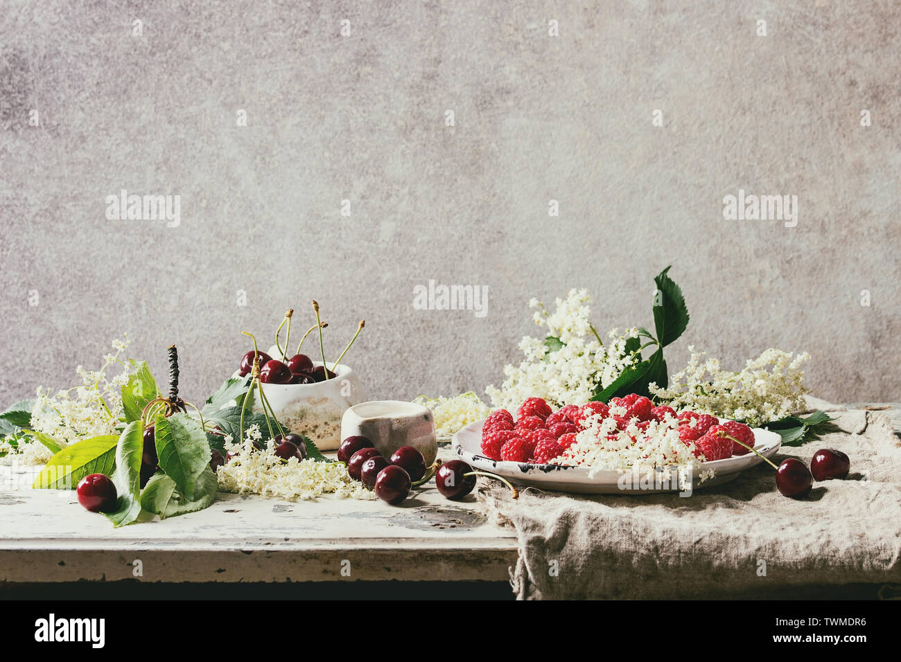 Fresh cherry and raspberry berries Stock Photo - Alamy
