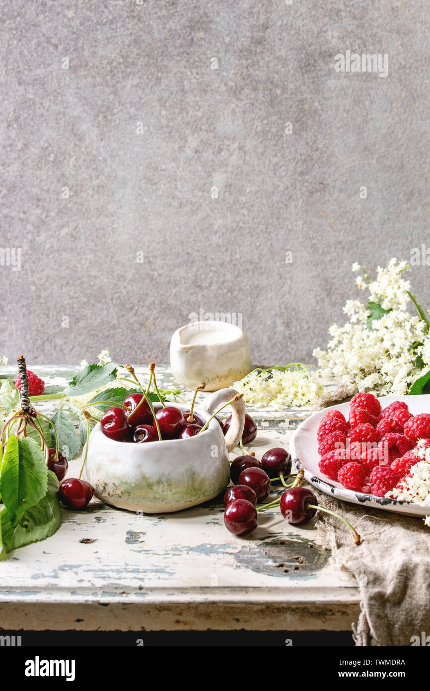 Fresh cherry and raspberry berries Stock Photo - Alamy