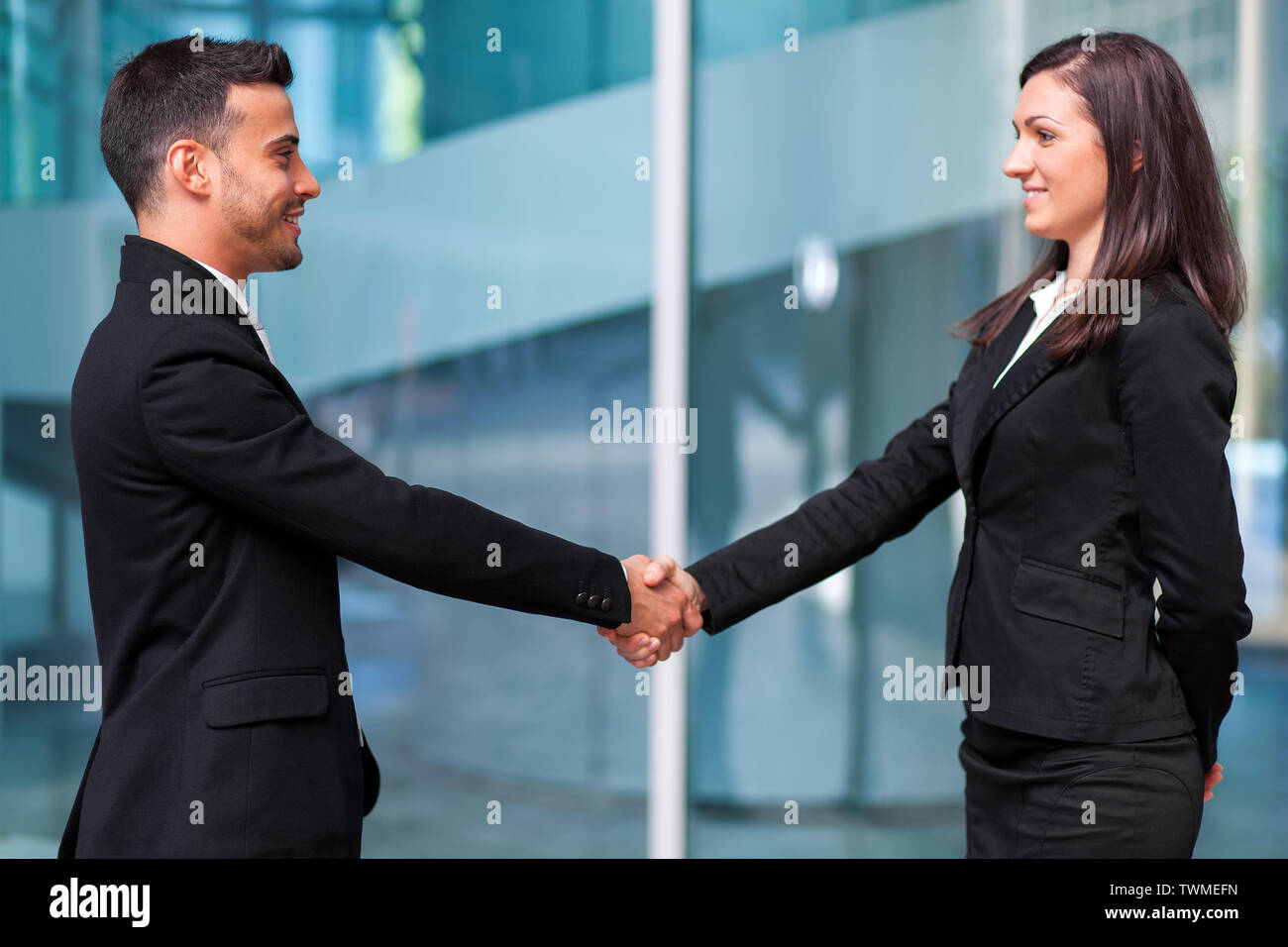 Business people handshake Stock Photo - Alamy