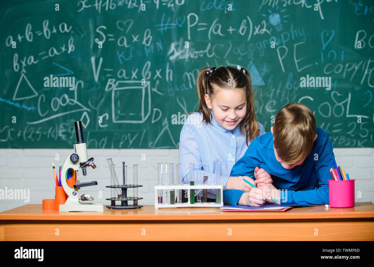 Chemistry science. biology experiments with microscope. Little kids ...