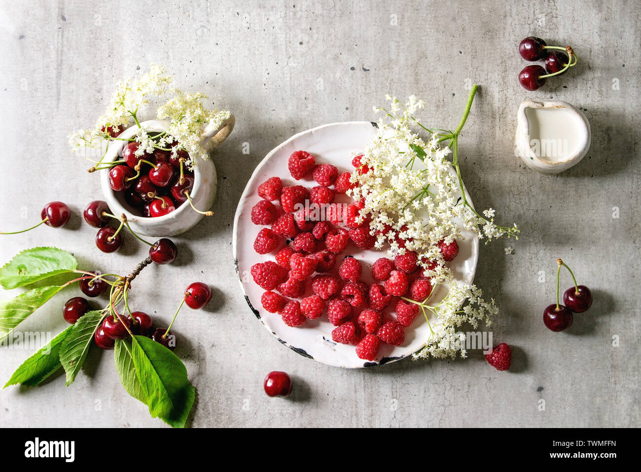 Fresh cherry and raspberry berries Stock Photo - Alamy