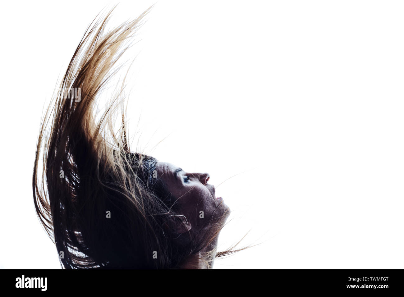 Portrait of middle-aged woman with moving hair Stock Photo - Alamy