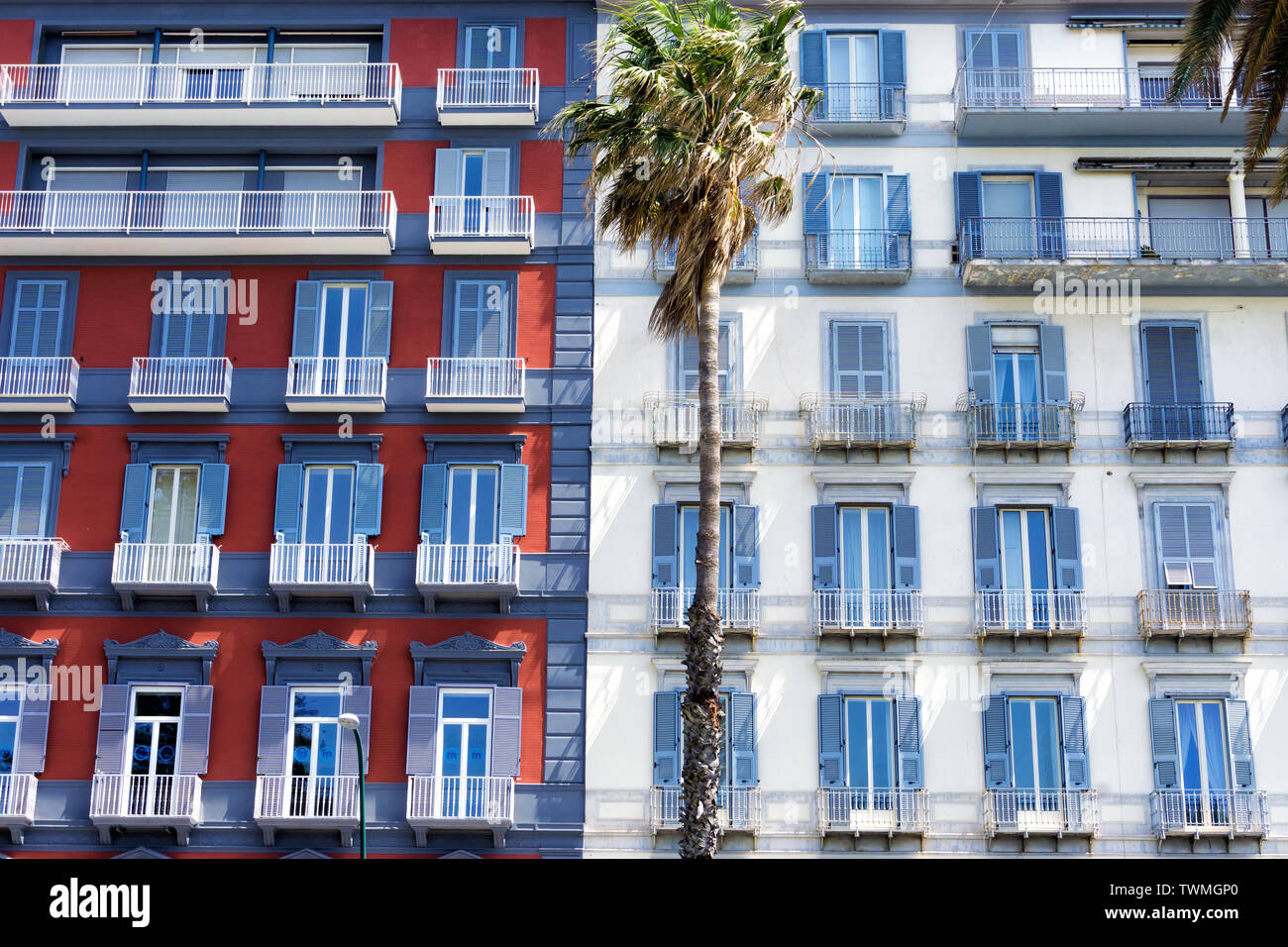 Red and white residential buildings in Naples, Italy Stock Photo - Alamy