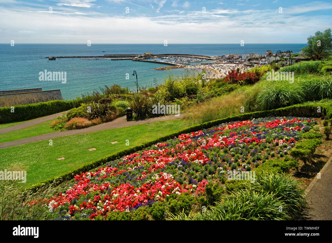 UK,Dorset,Lyme Regis,View across Langmoor Gardens towards The Cobb ...
