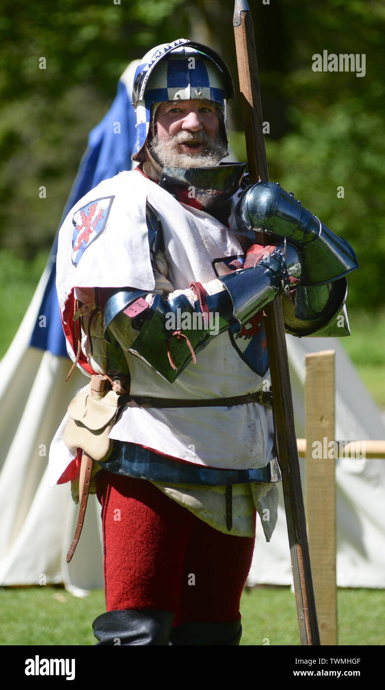 Reenactor in medieval knights clothing Stock Photo - Alamy