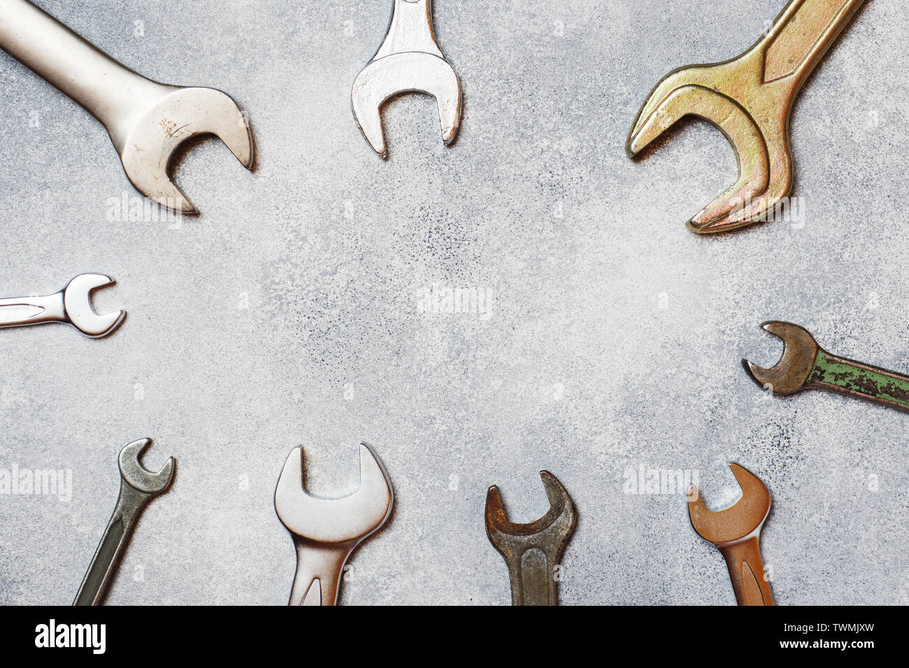 Wrenches, tools on gray concrete background with copy space Stock Photo ...