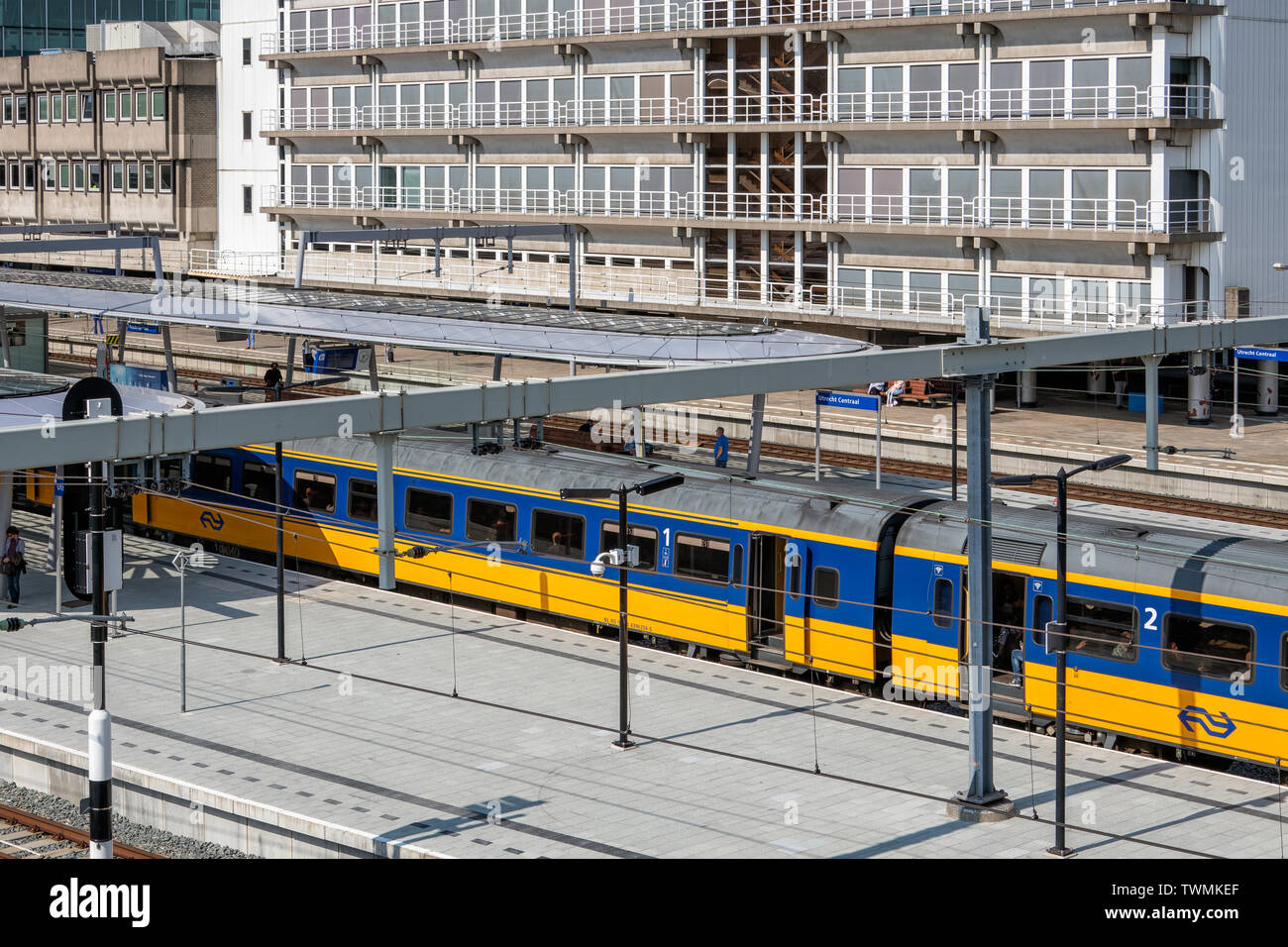 Railway station Utrecht with waiting trains and travelers Stock Photo ...
