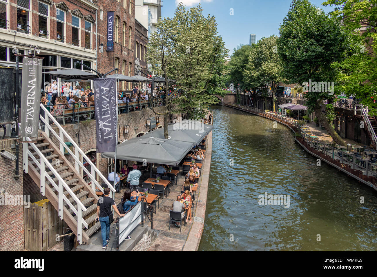 Dutch city Utrecht with shopping people and terraces along canal Stock ...