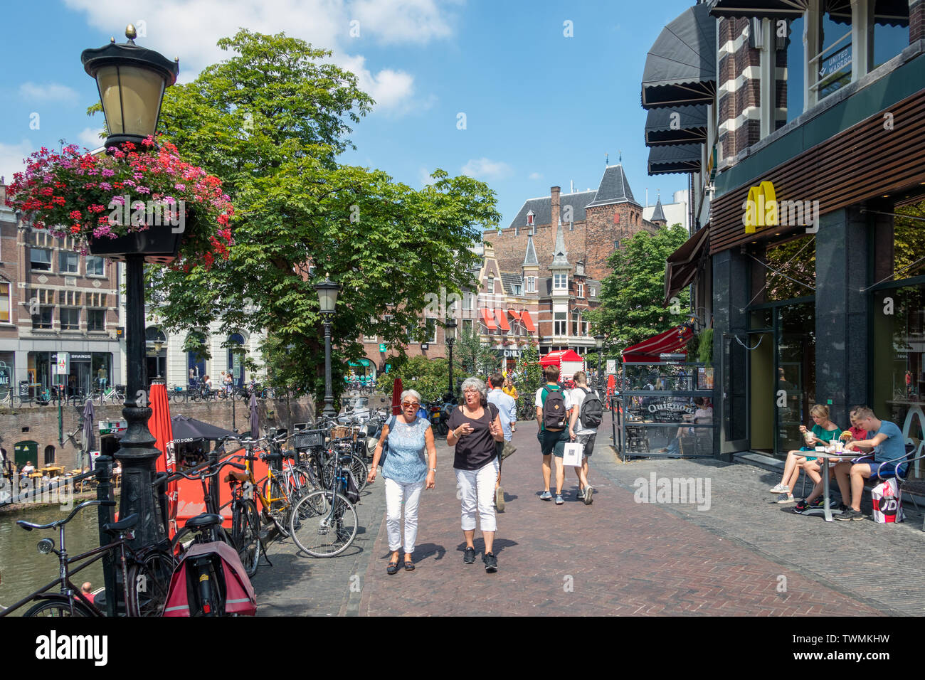 Two women walking downtown Dutch city Utrecht in shopping street Stock ...