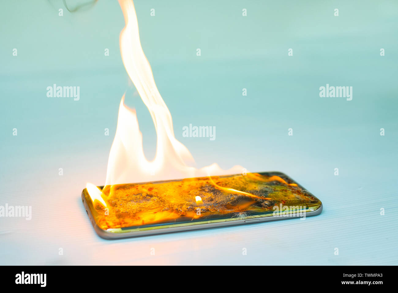 mobile on fire Stock Photo - Alamy