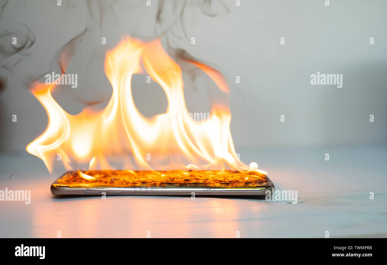 mobile on fire Stock Photo - Alamy