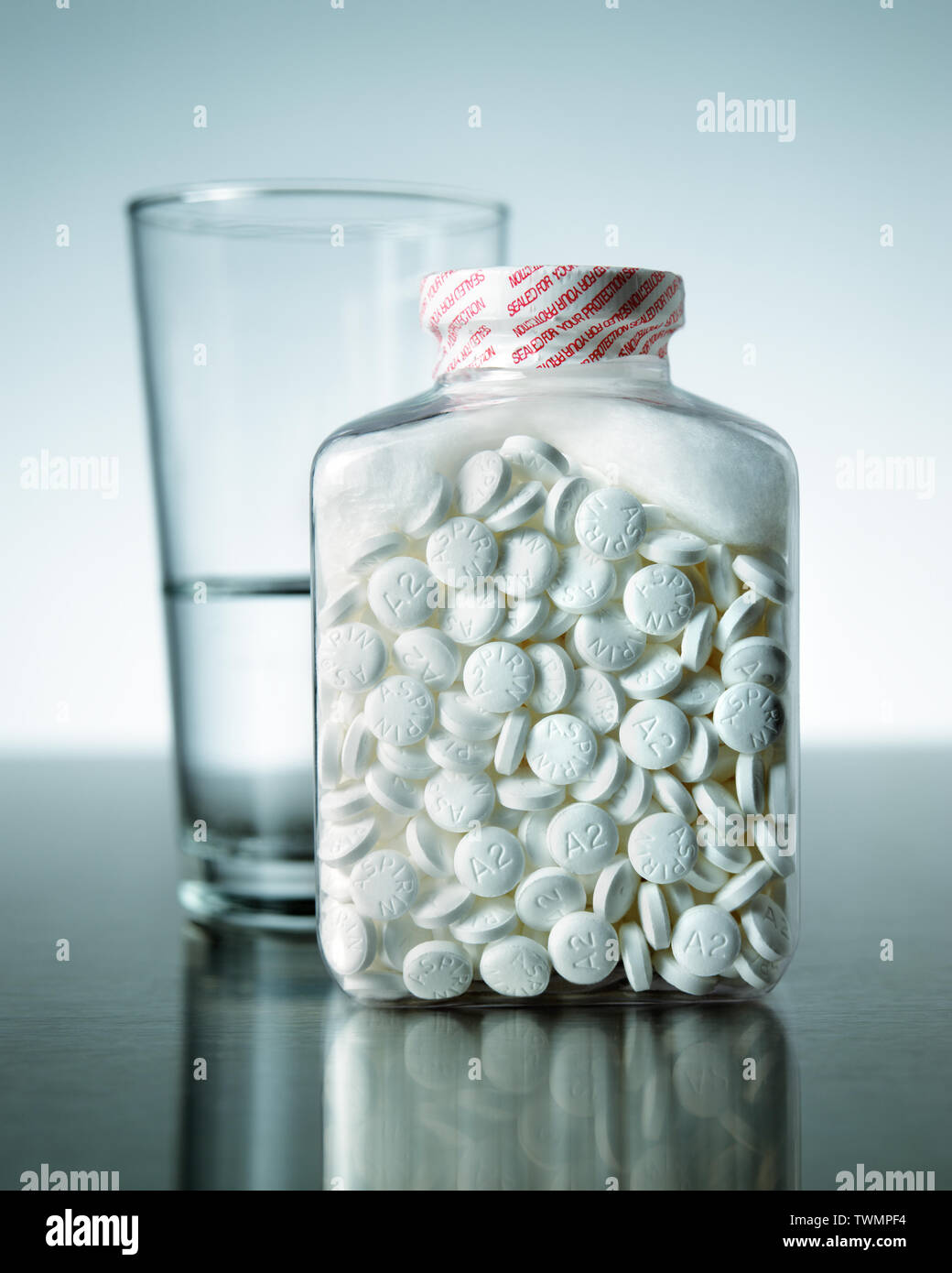 Safety sealed bottles of aspirin pills commonly used as an anti ...