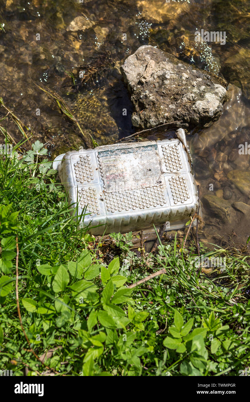 Plastic packaging dumped in nature Stock Photo - Alamy