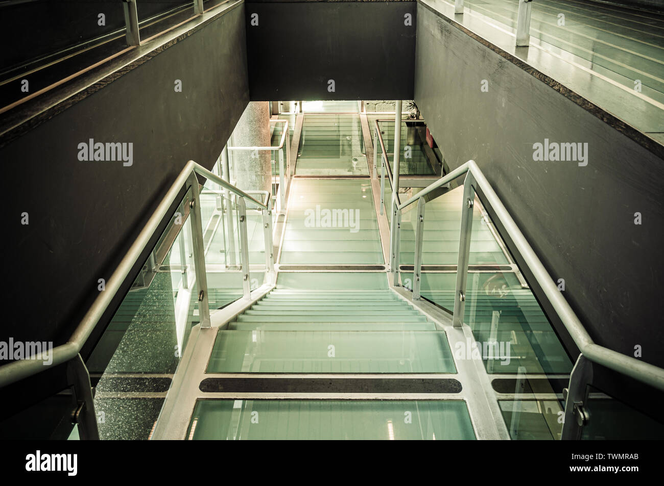 Modern staircase down perspective Stock Photo - Alamy