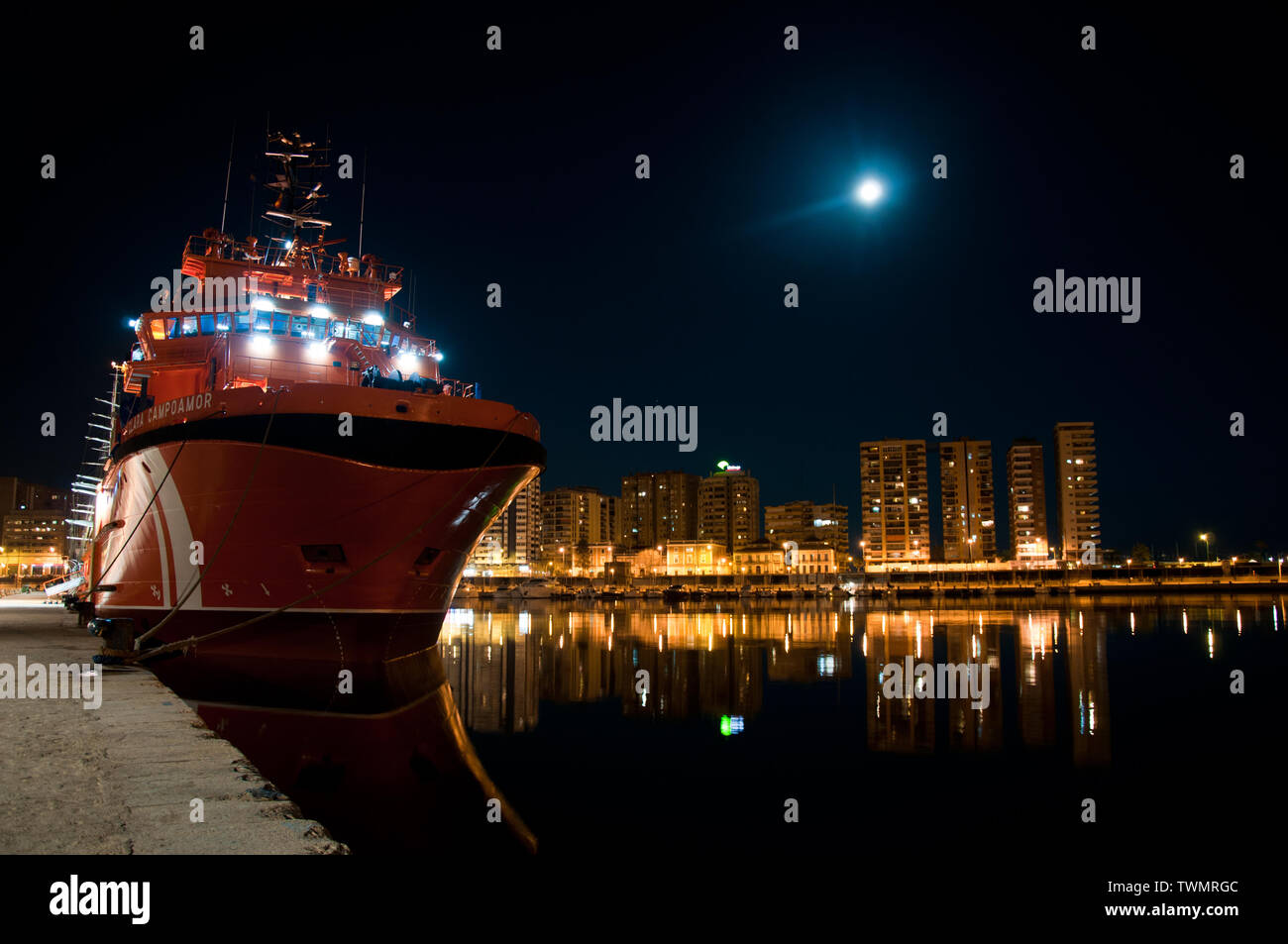 Malaga's port and Muelle uno at Night Stock Photo - Alamy