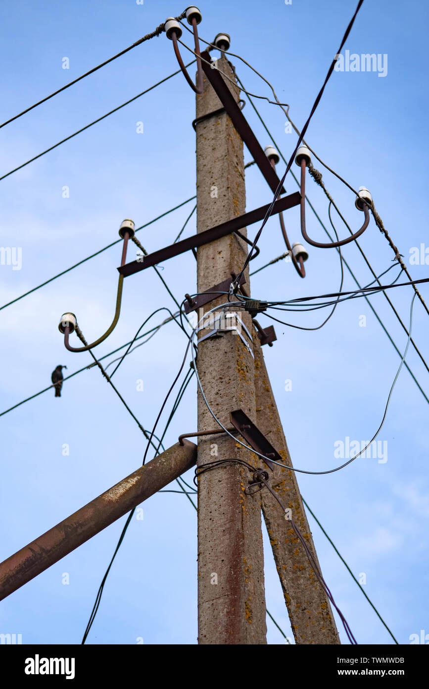 concrete power pole with electrical wires Stock Photo - Alamy
