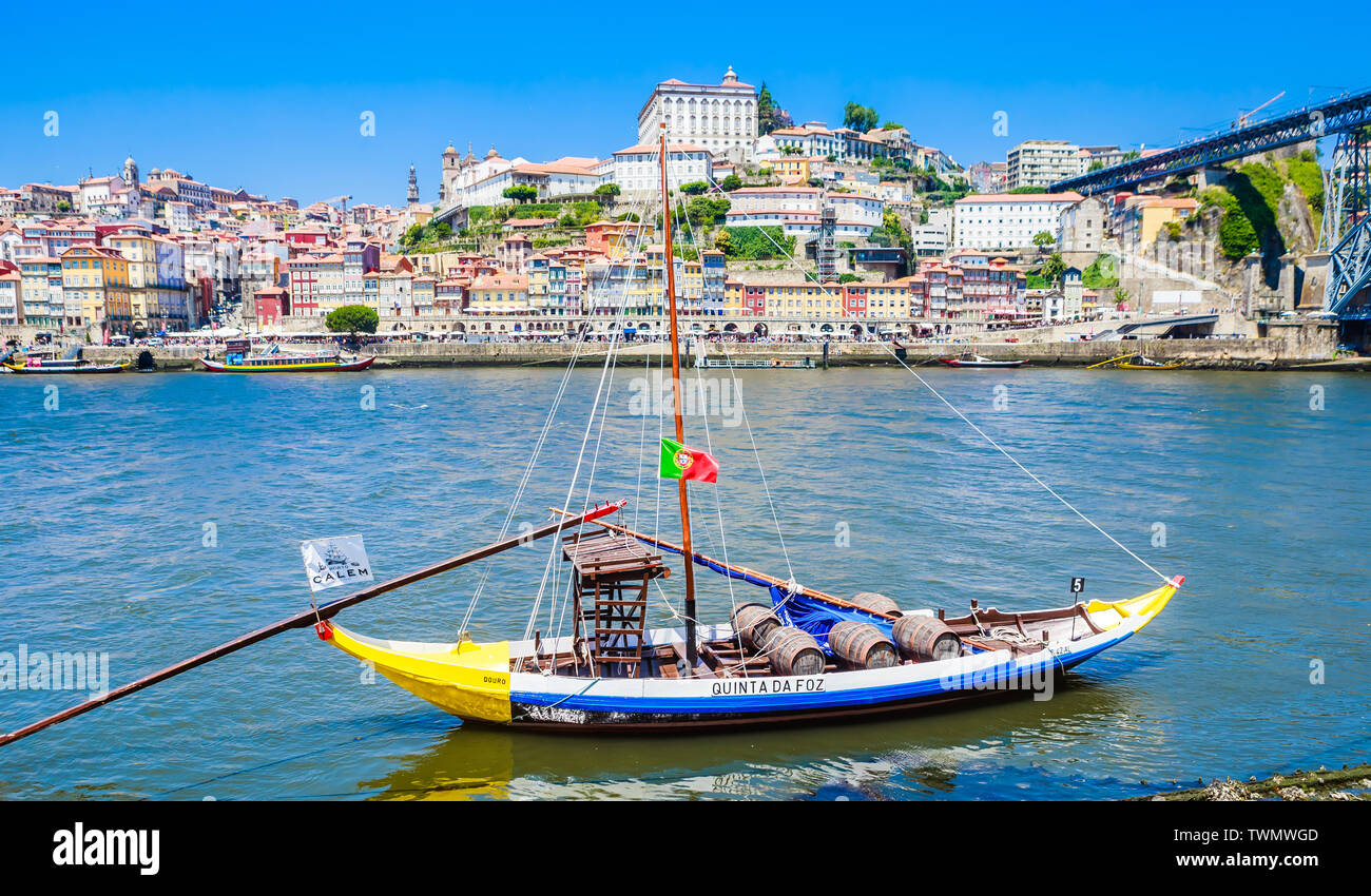 Old Porto and traditional boat with wine barrels, Portugal Stock Photo ...