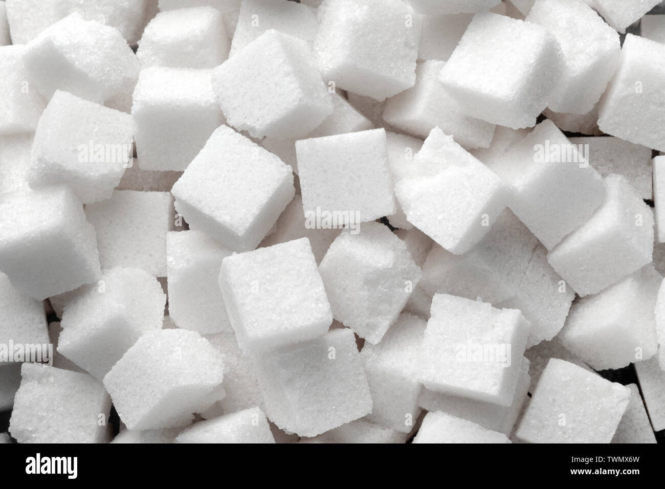 white sugar cubes, background image Stock Photo - Alamy