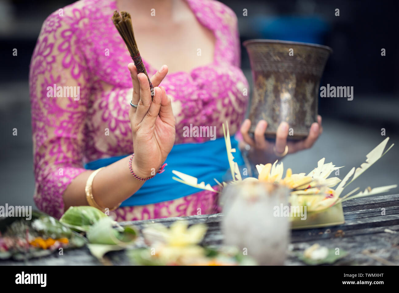 ritual with the offering for God, traditional Balinese praying Stock ...
