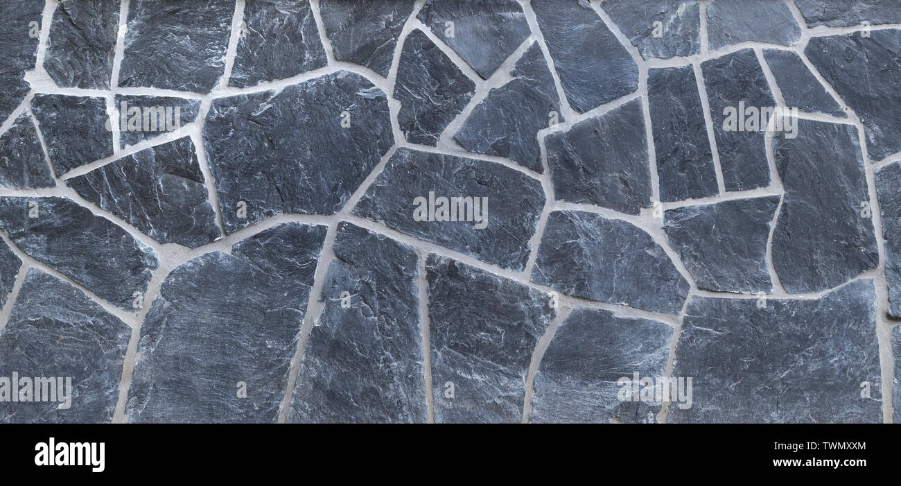 High resolution full frame background of a wall made of old and ...