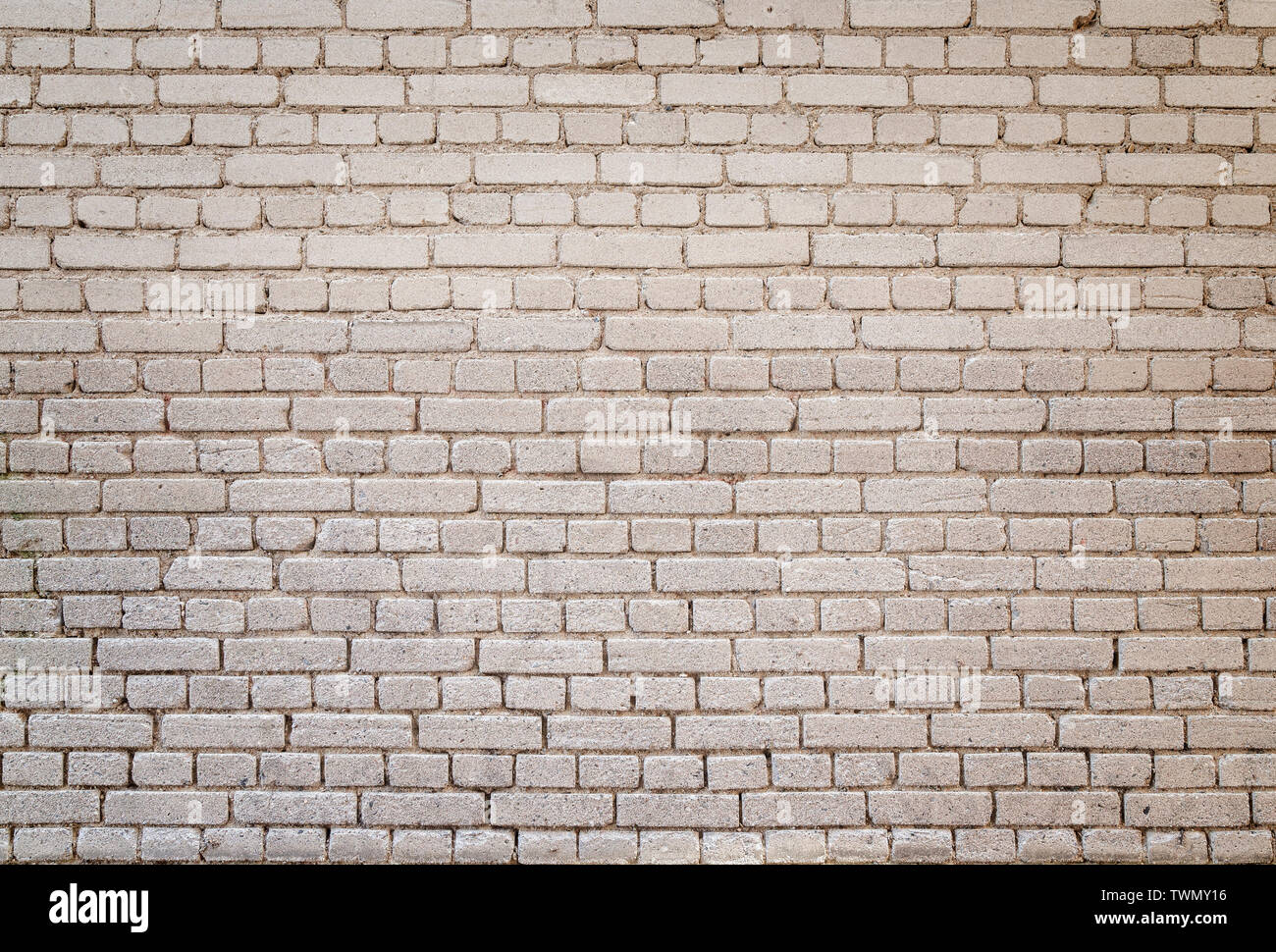 High resolution full frame background of detailed old pale brick wall ...