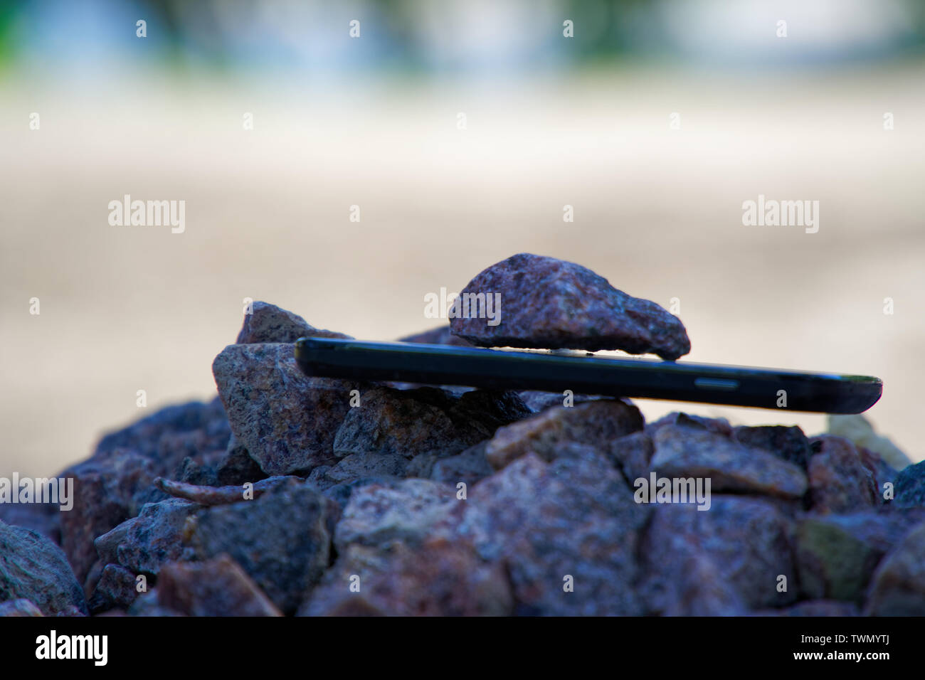 Cell phone with broken glass on gravel granite stones, unbreakable ...
