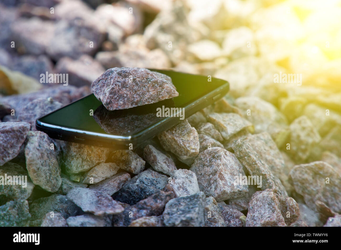 Cell phone with broken glass on gravel granite stones, unbreakable ...