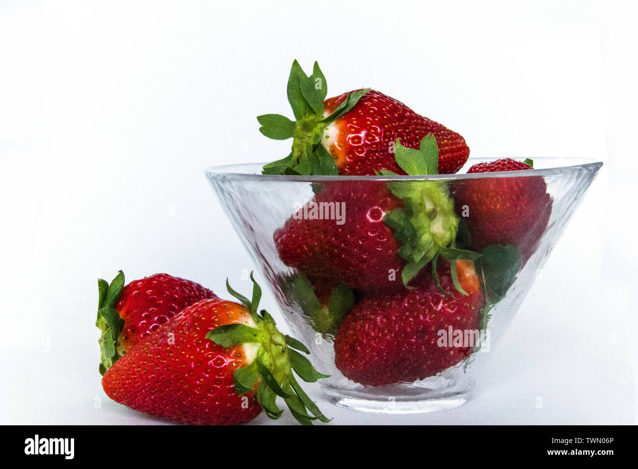 Healthy strawberries in transparent cup hi-res stock photography and ...