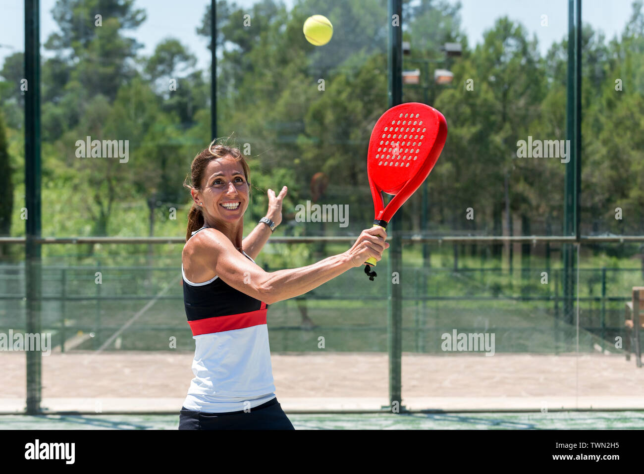 Female playing padel tennis hi-res stock photography and images - Alamy