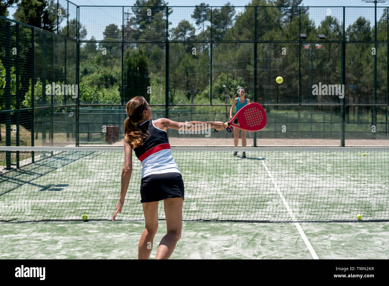 Woman playing padel outdoor Stock Photo - Alamy