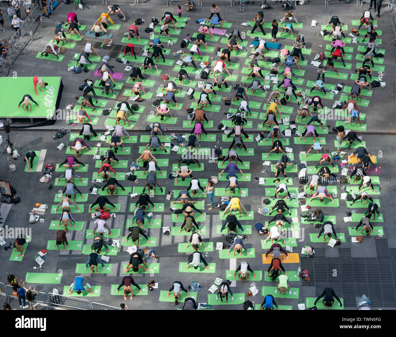 New York, NY - June 21, 2019: Hundreds yoga enthusiasts participate in ...