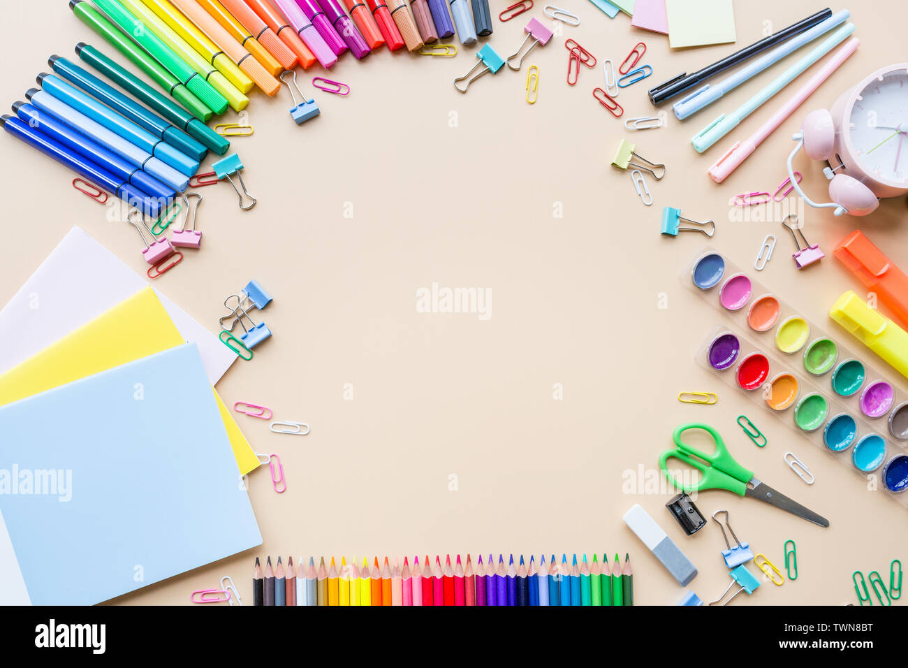 Orange back to school flat lay with bright stationery. School supplies ...