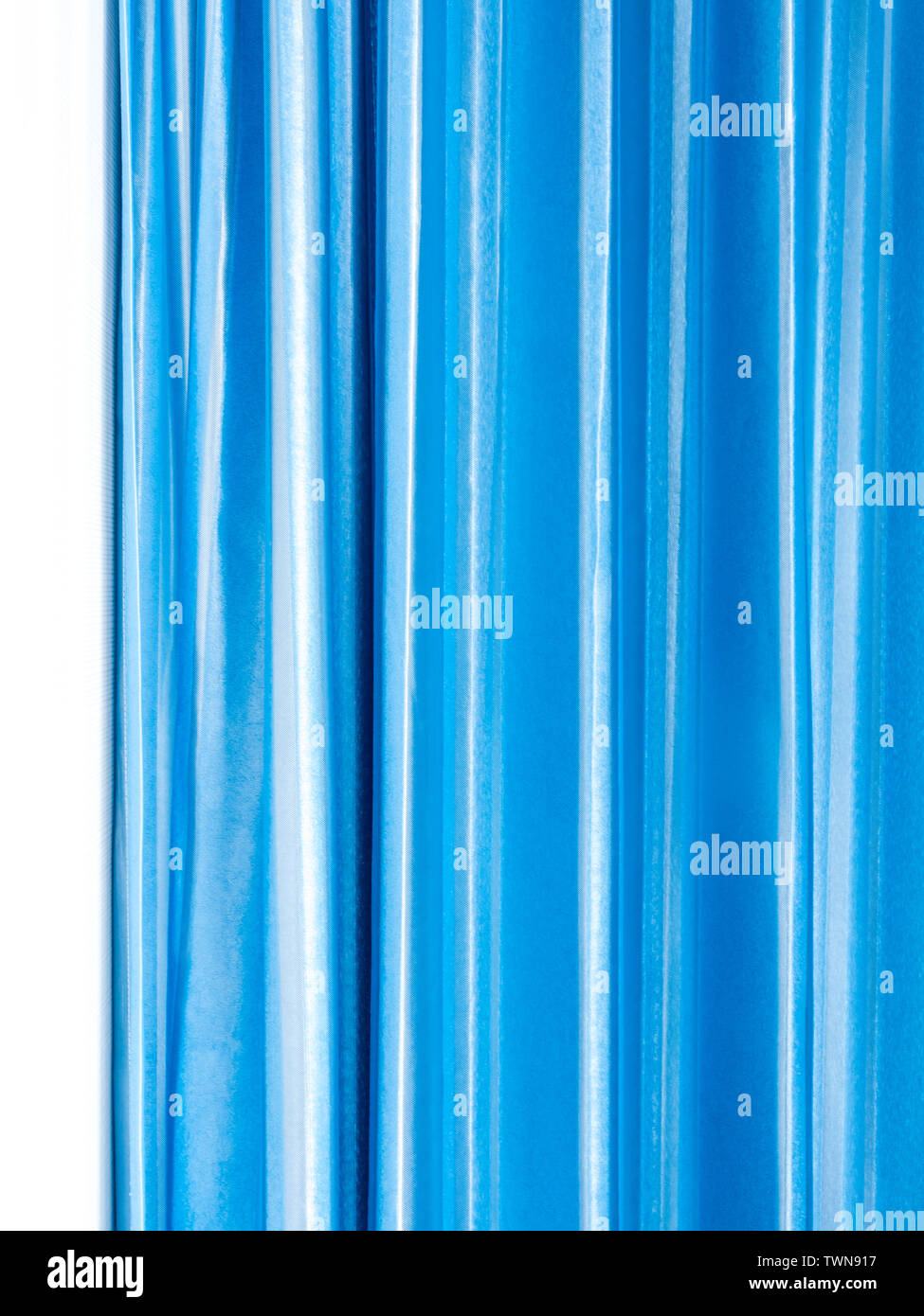 Bright and shiny blue color of curtain Stock Photo - Alamy